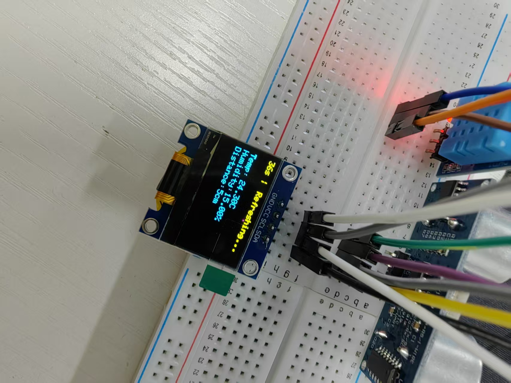 Arduino智能传感器：温湿度与距离的完美监测OLED显示_ssd1315 arduino-CSDN博客