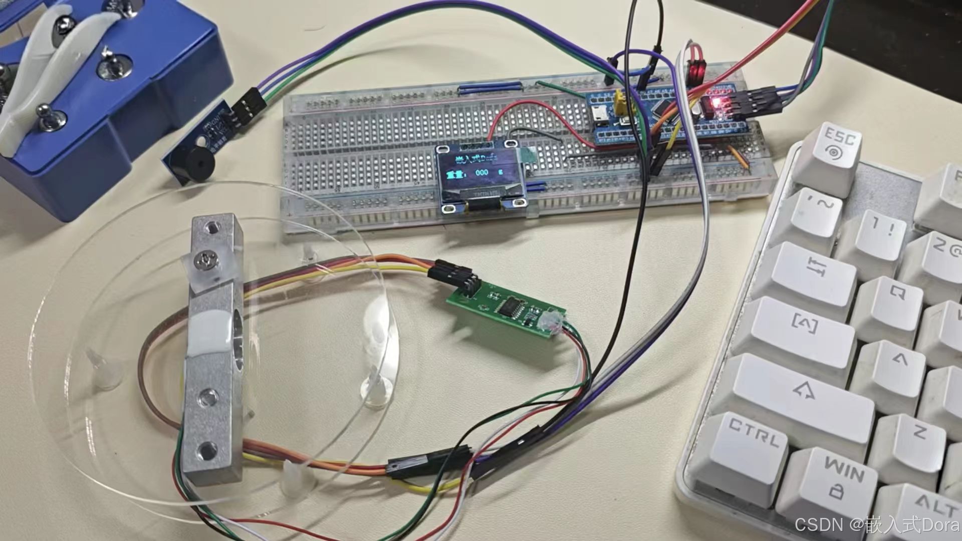 STM32单片机+HX711模块+压力传感器+OLED屏幕+蜂鸣器报警+重量数据发送到串口调试助手+源代码_stm32+hx711-CSDN博客