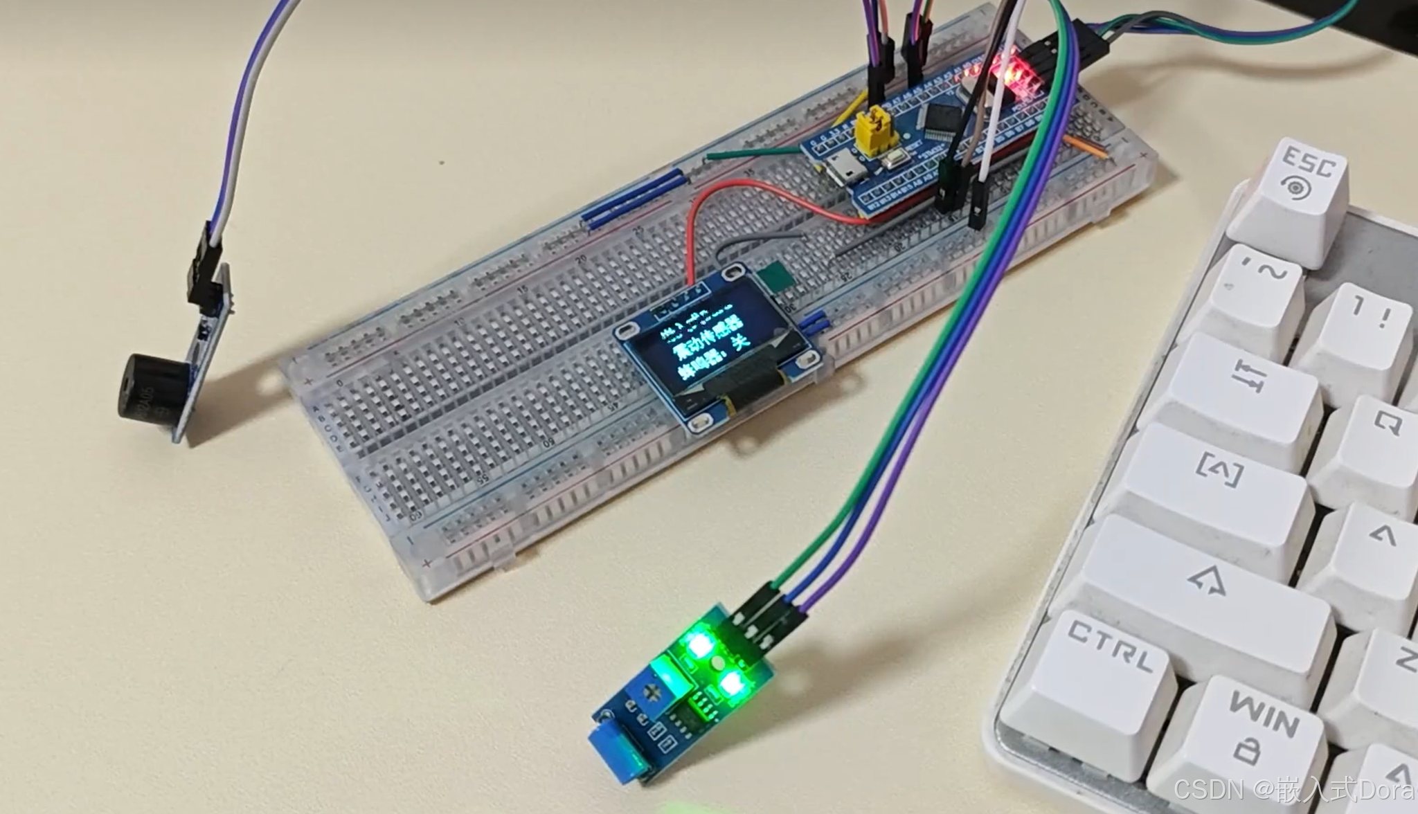 STM32单片机+震动传感器+OLED屏幕+蜂鸣器报警+震动报警数据发送到串口调试助手+源代码_c06振动传感元件驱动代码-CSDN博客