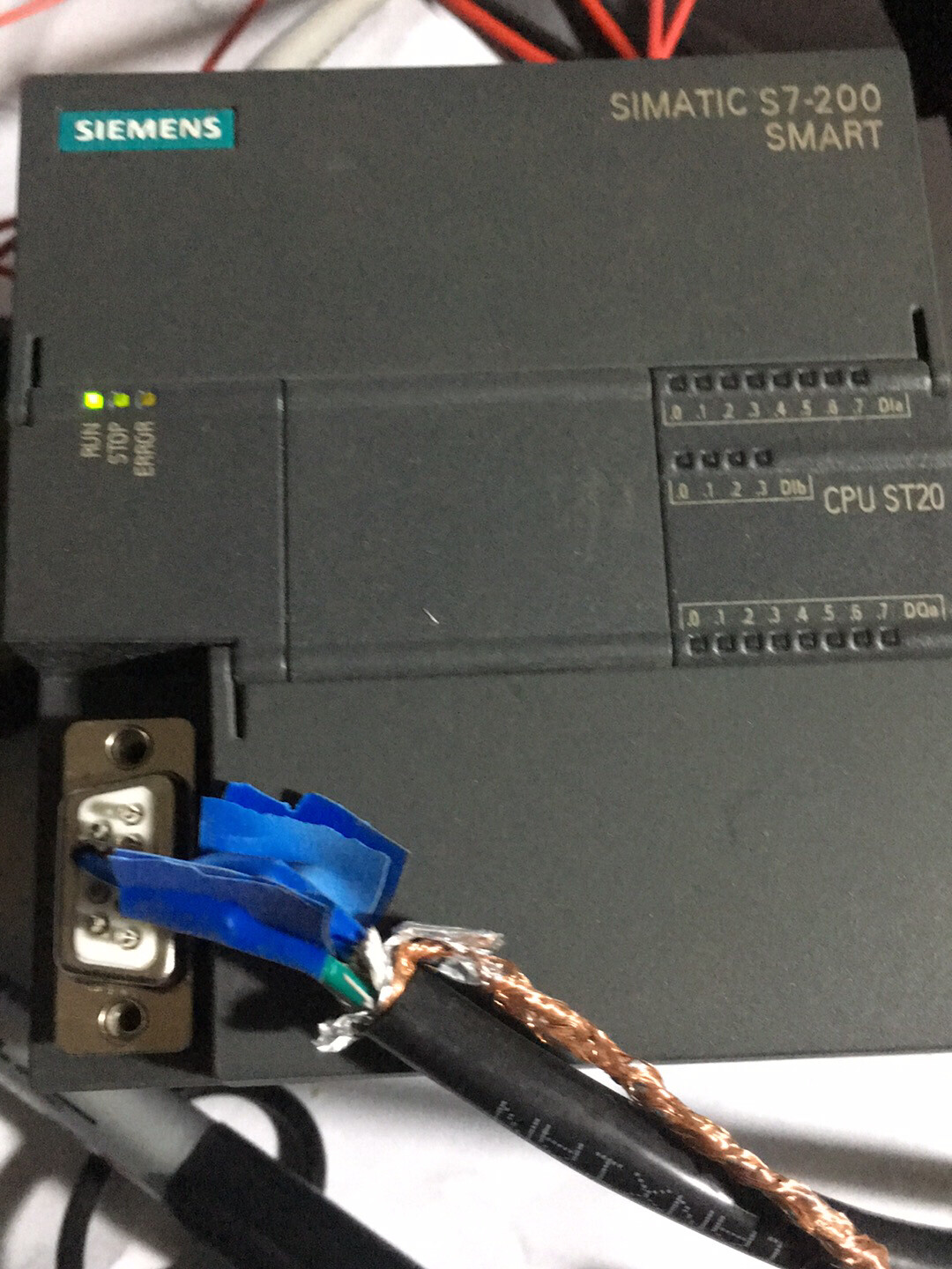 西门子S7-200 Smart PLC与V20变频器Modbus通讯：实现稳定控制及自动化管理_200smart与v20变频器进行modbus通讯-CSDN博客